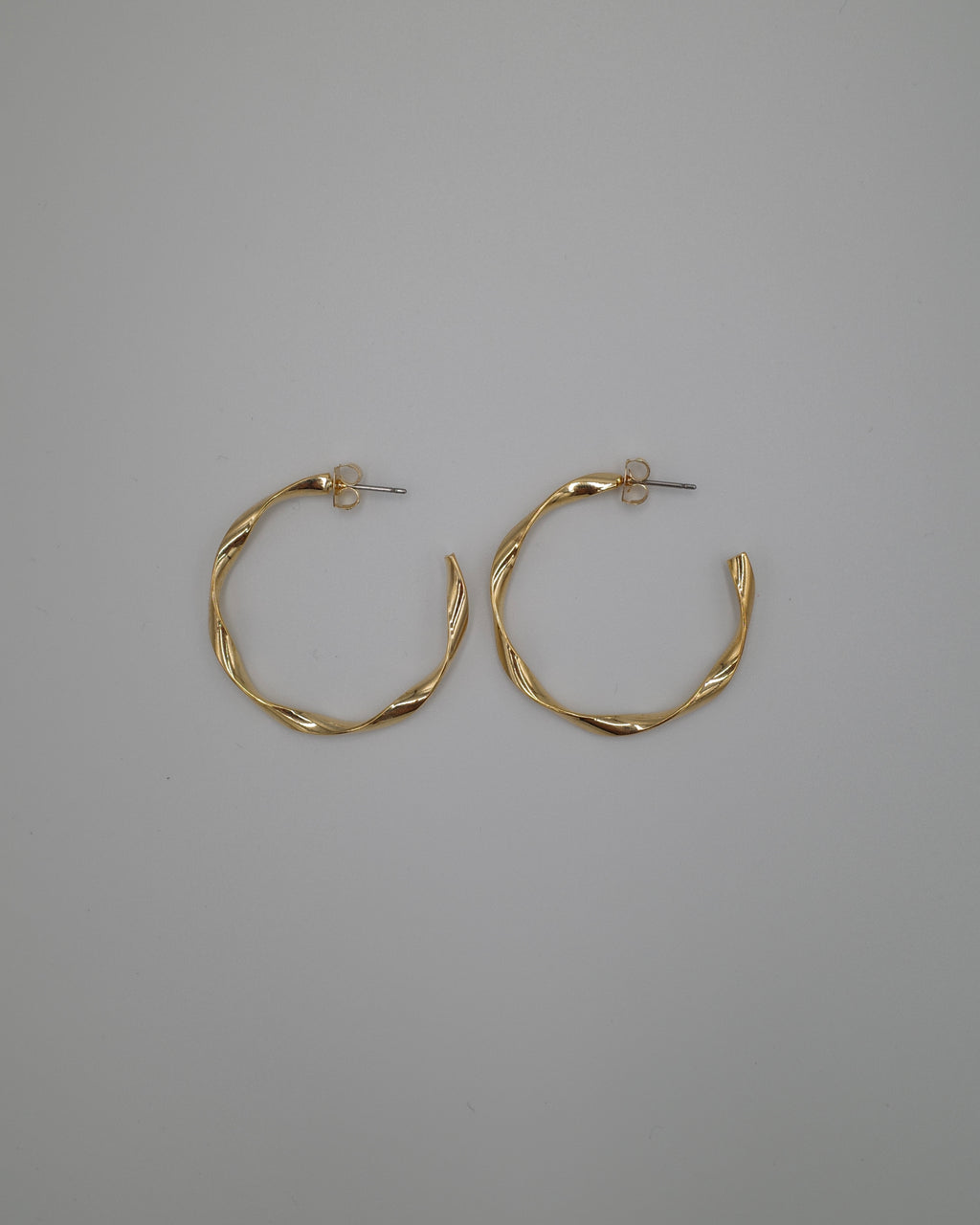 twist hoop pierce – beller